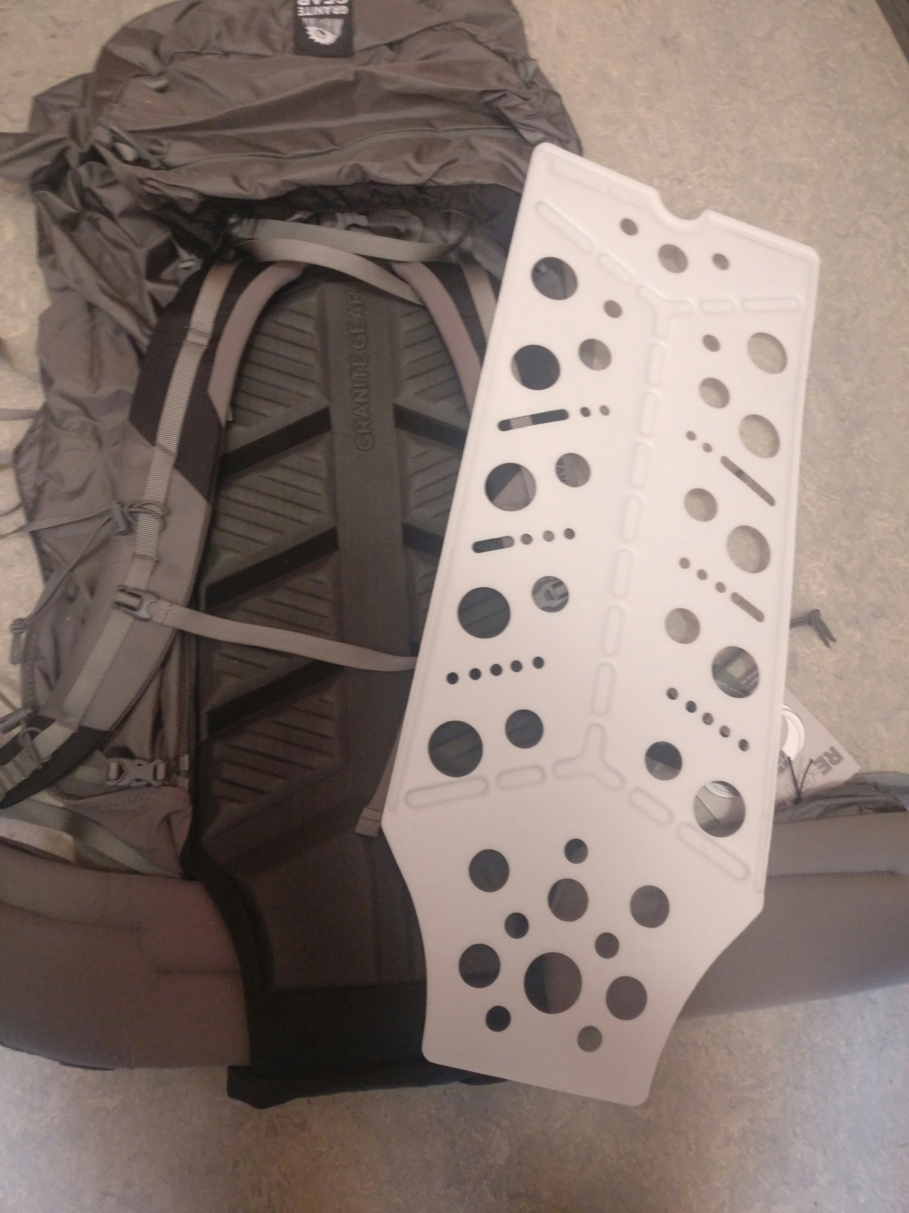 The Plastic back support is removable and weighs about 180g | Drop