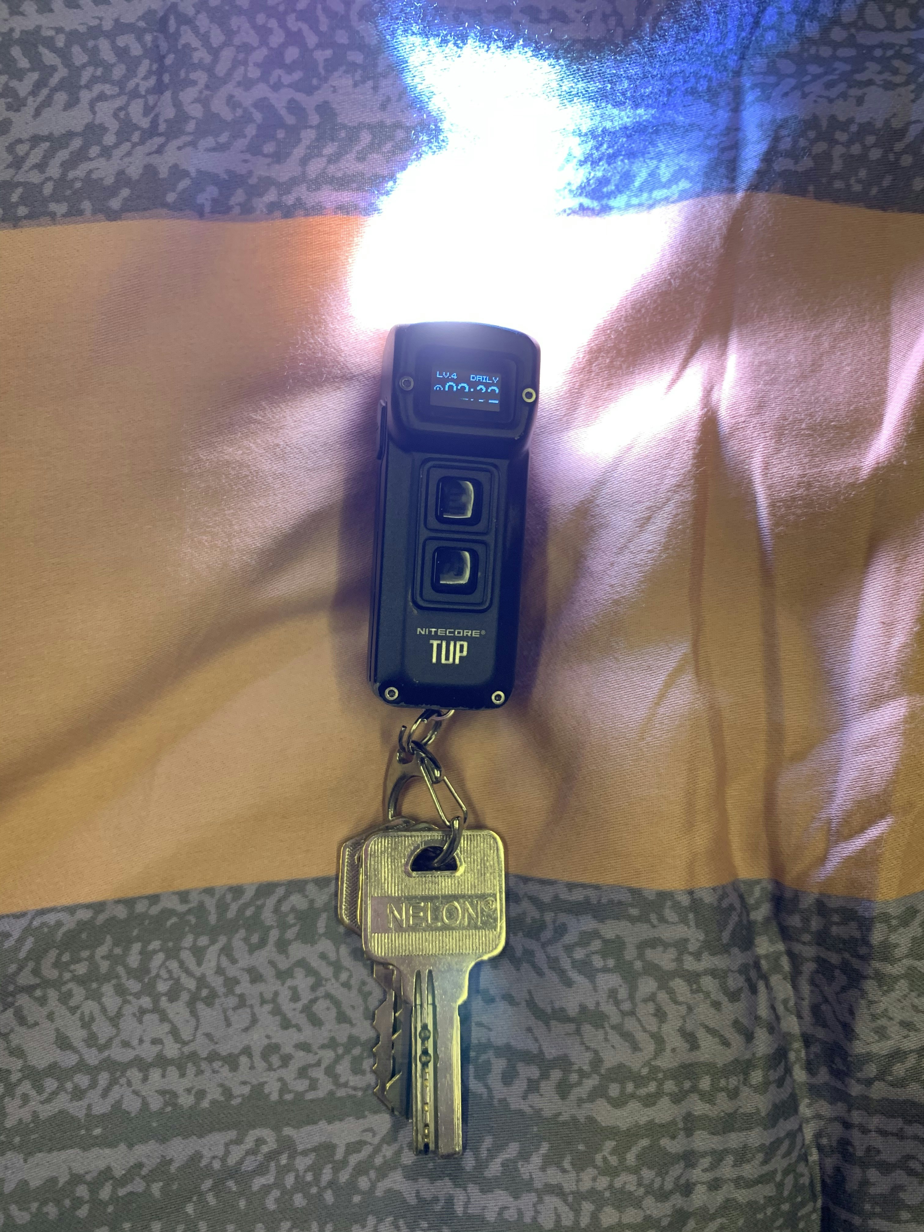 Nitecore 1,000-Lumen TUP Pocket Light | Flashlights | Small Flashlights ...