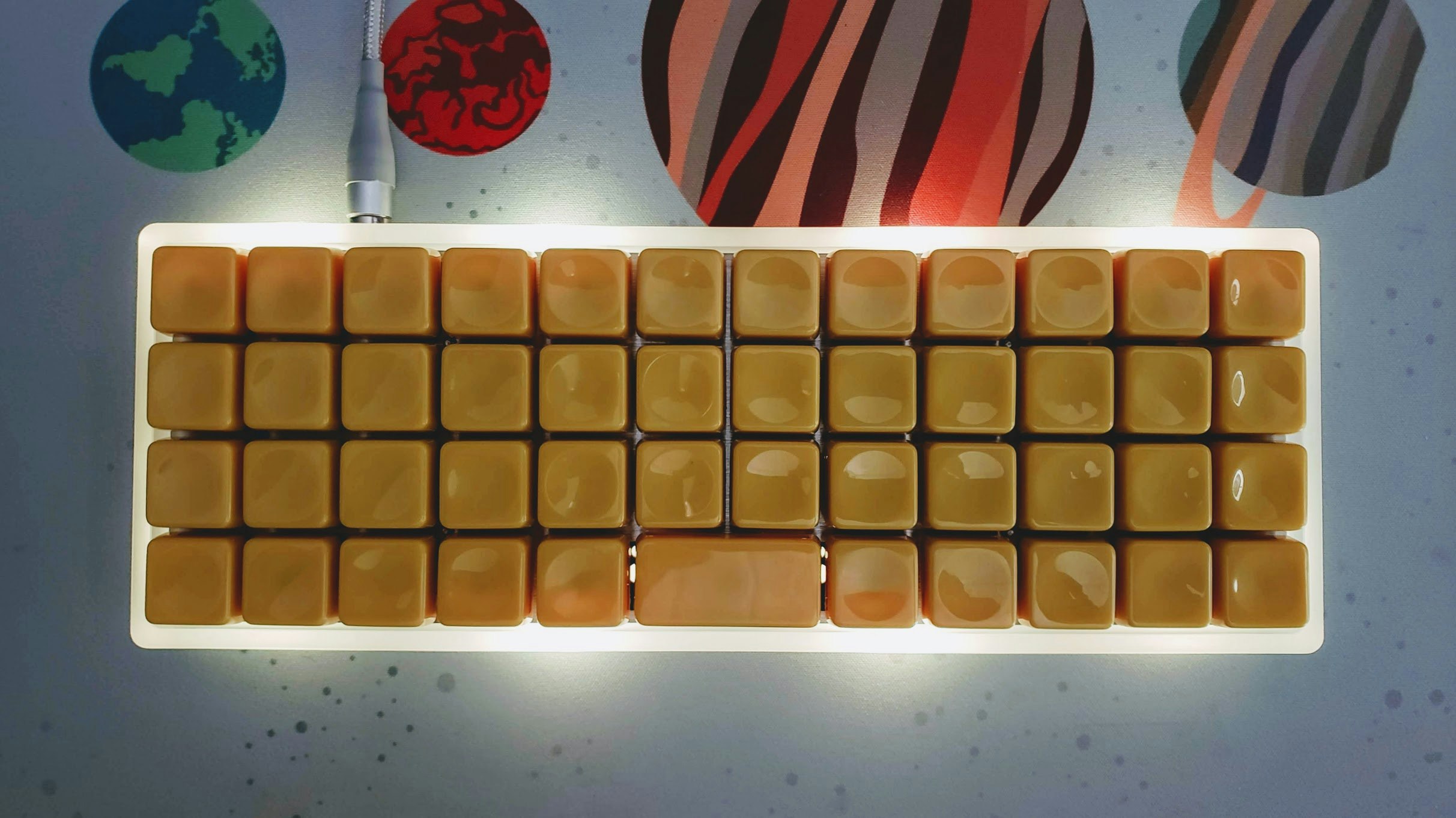 Planck in acrylic hi-pro case and Rama Works Grid keycaps in Yolk | Drop