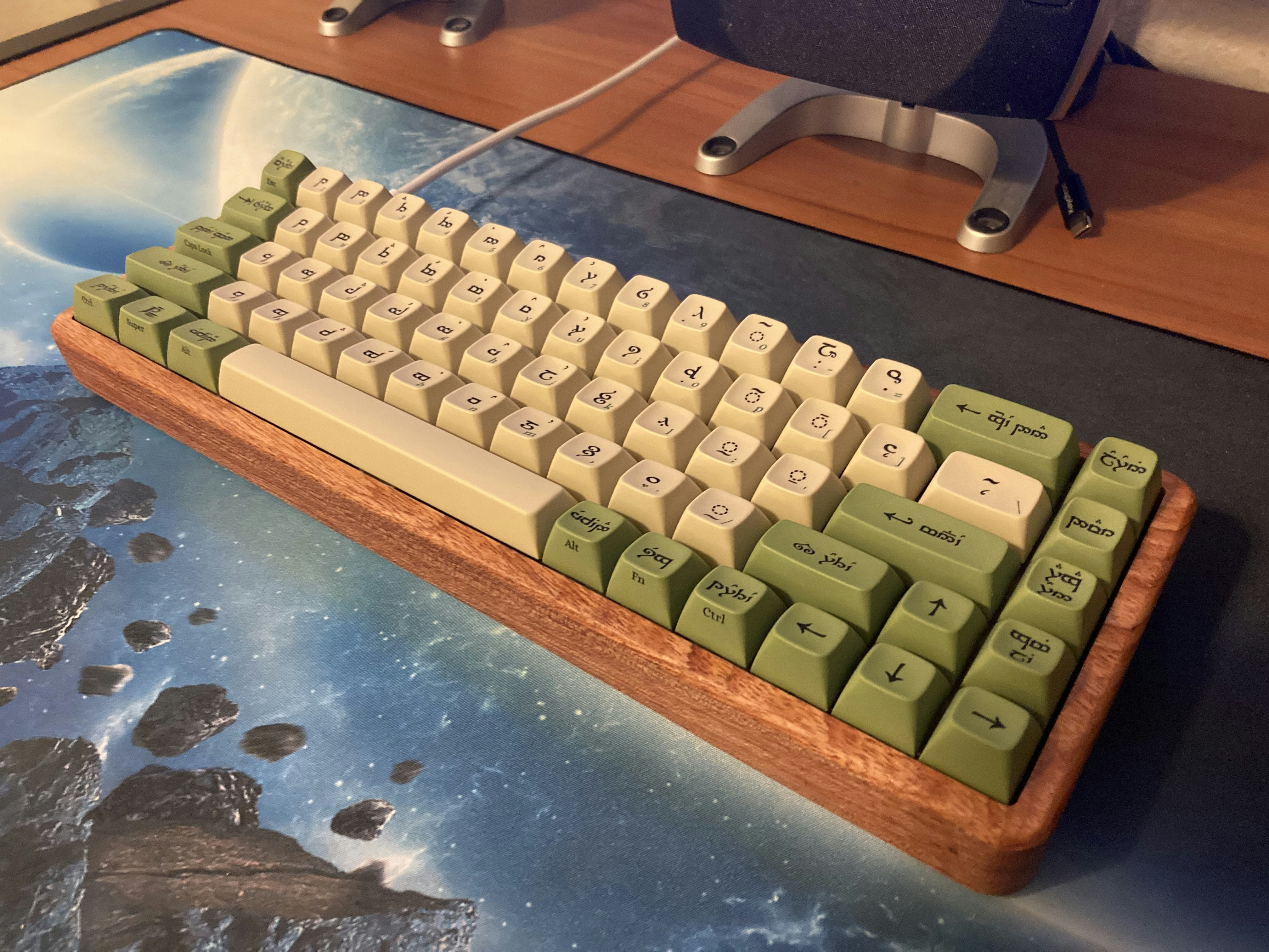 Elvish training keycaps on a 65% rosewood case | Drop