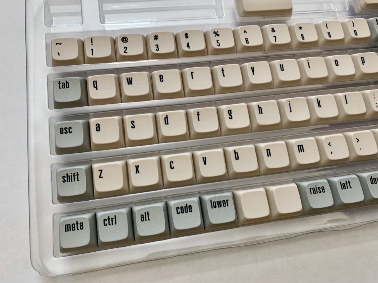 There is a orange tint on the alpha keycaps. | Drop