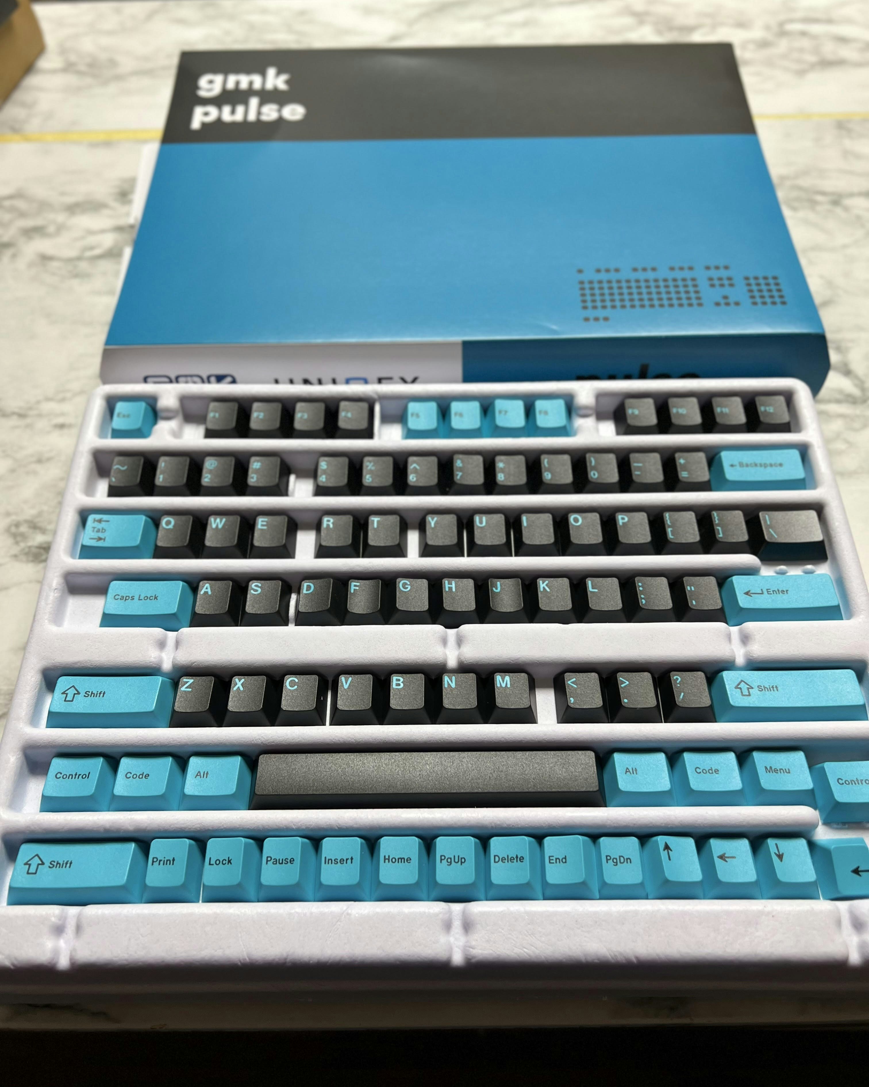 GMK Pulse in its packaging | Drop