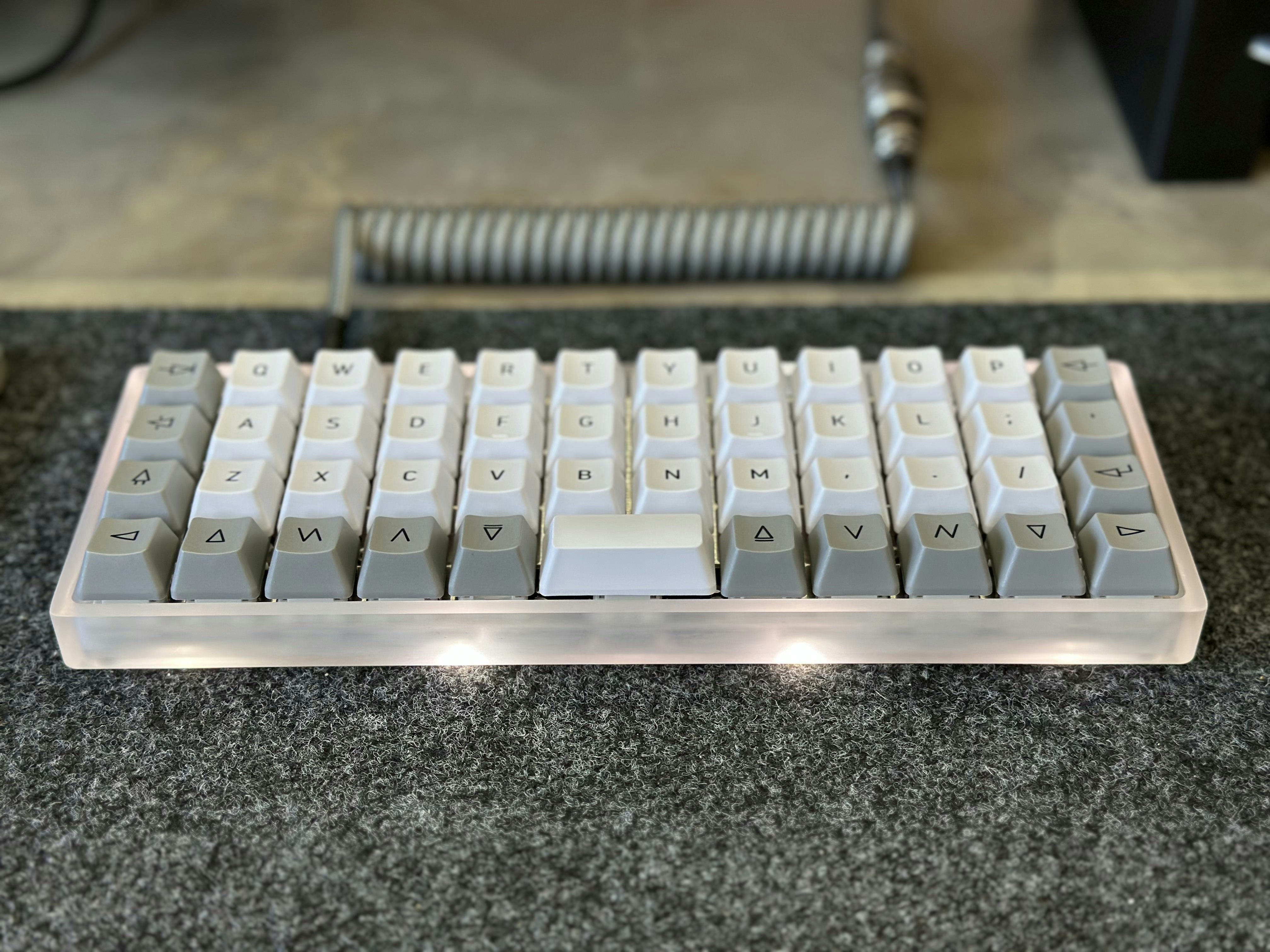 Planck Polycarbonate + Acute Keycaps + Invyr Holy Panda | Drop