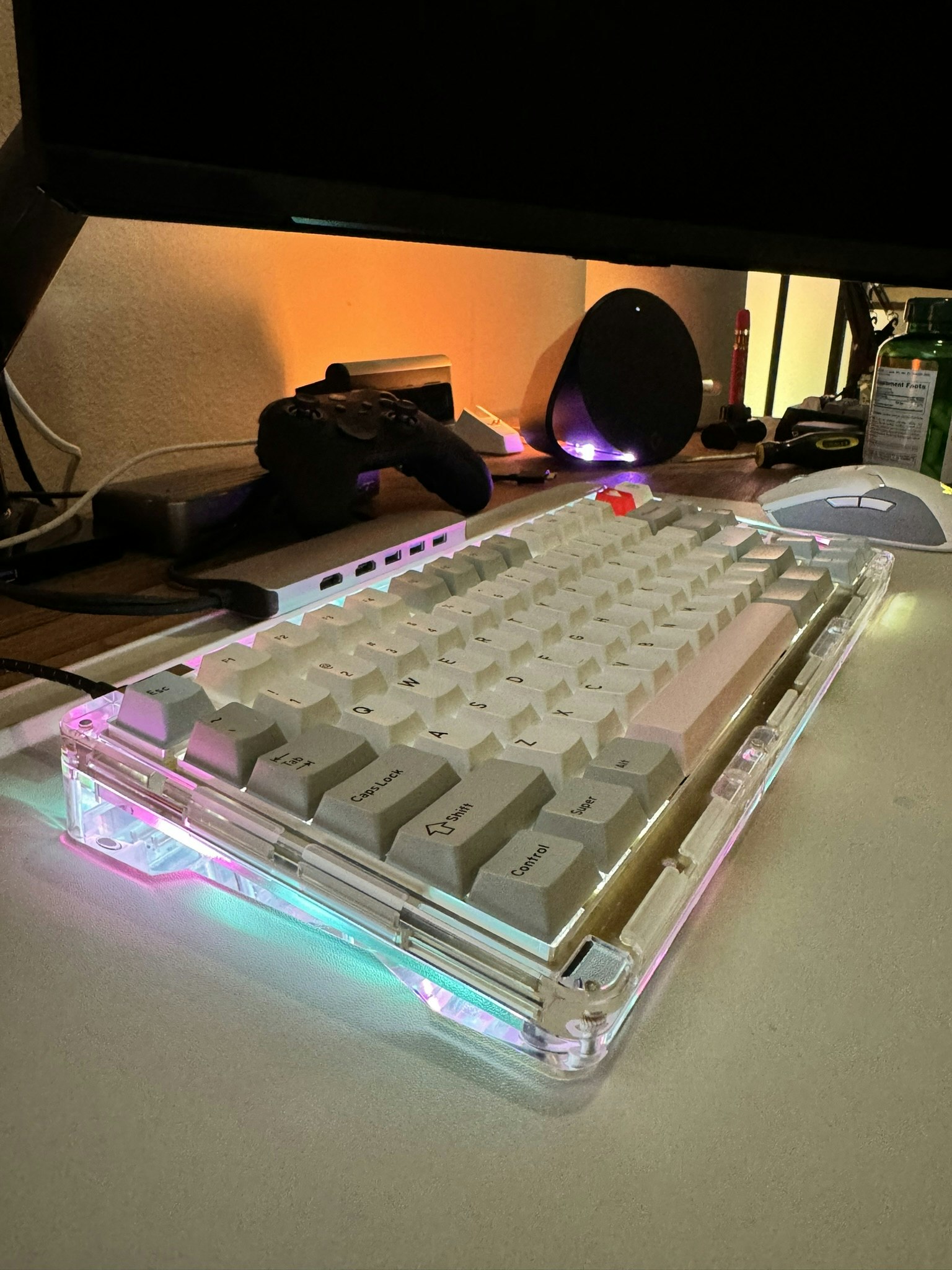 Planck in acrylic hi-pro case and Rama Works Grid keycaps in Yolk | Drop