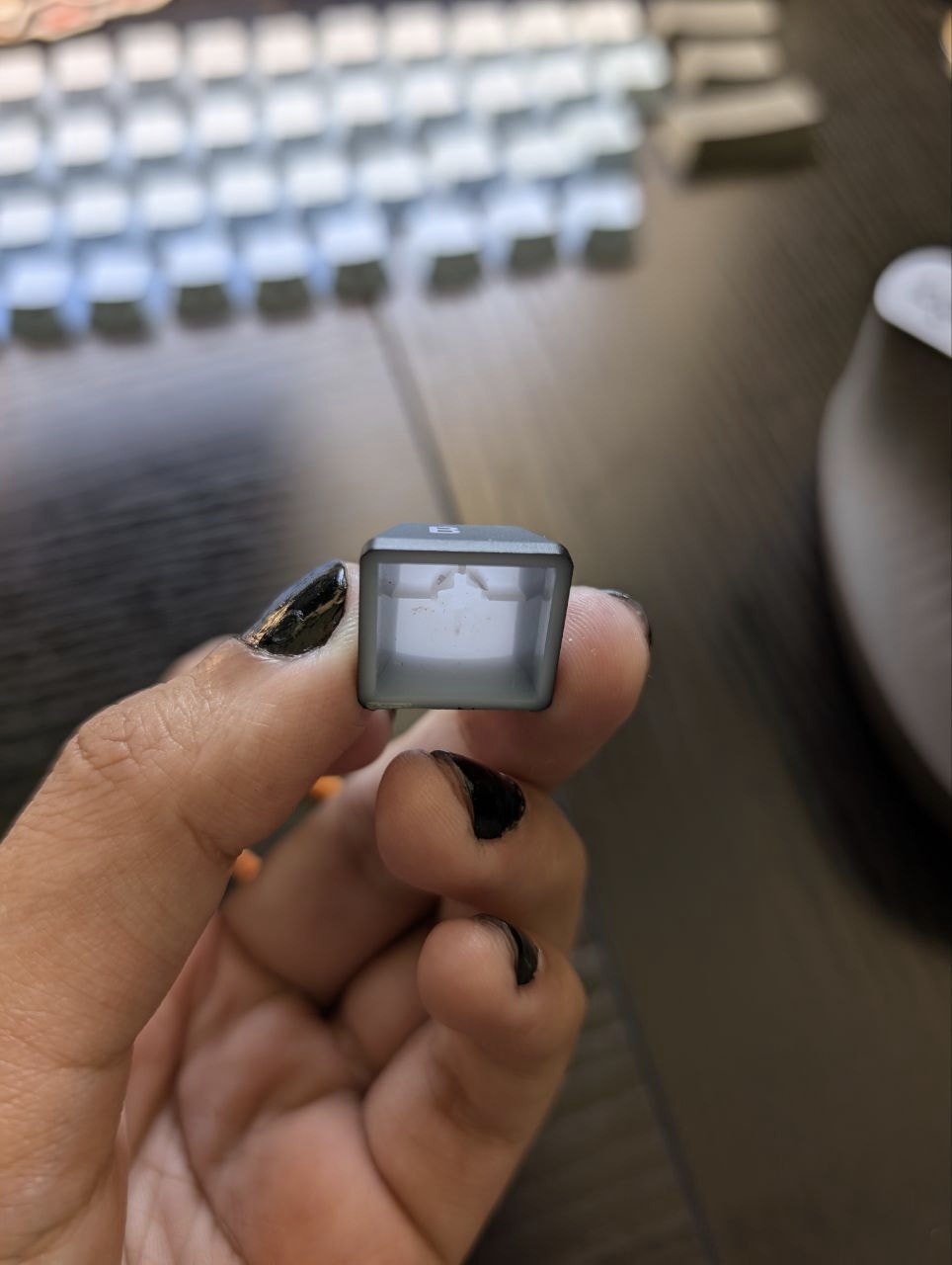 Received a broken key (B Keycap) with noone to contact to. Other than ...